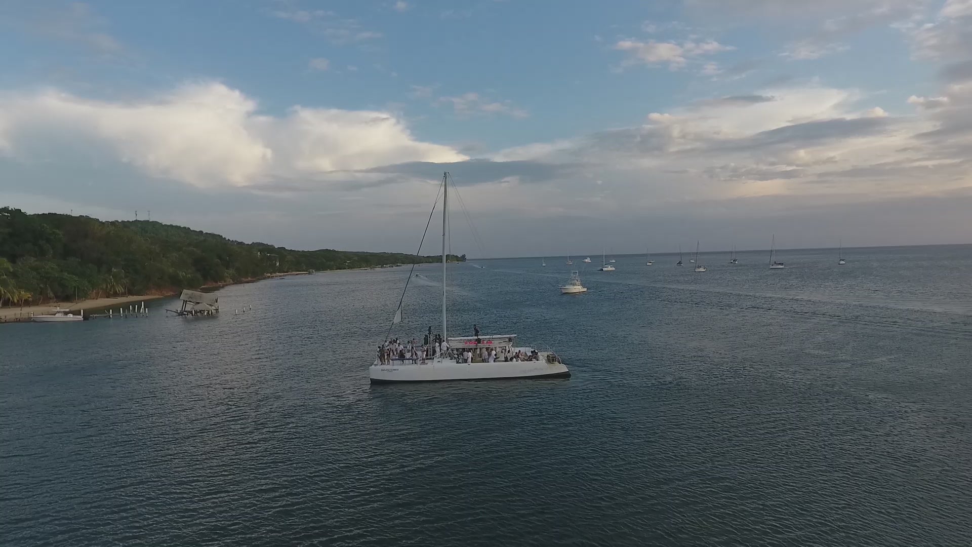 Serenity Sunset Catamaran Lounge & Cruise – Jolly Roger Roatan